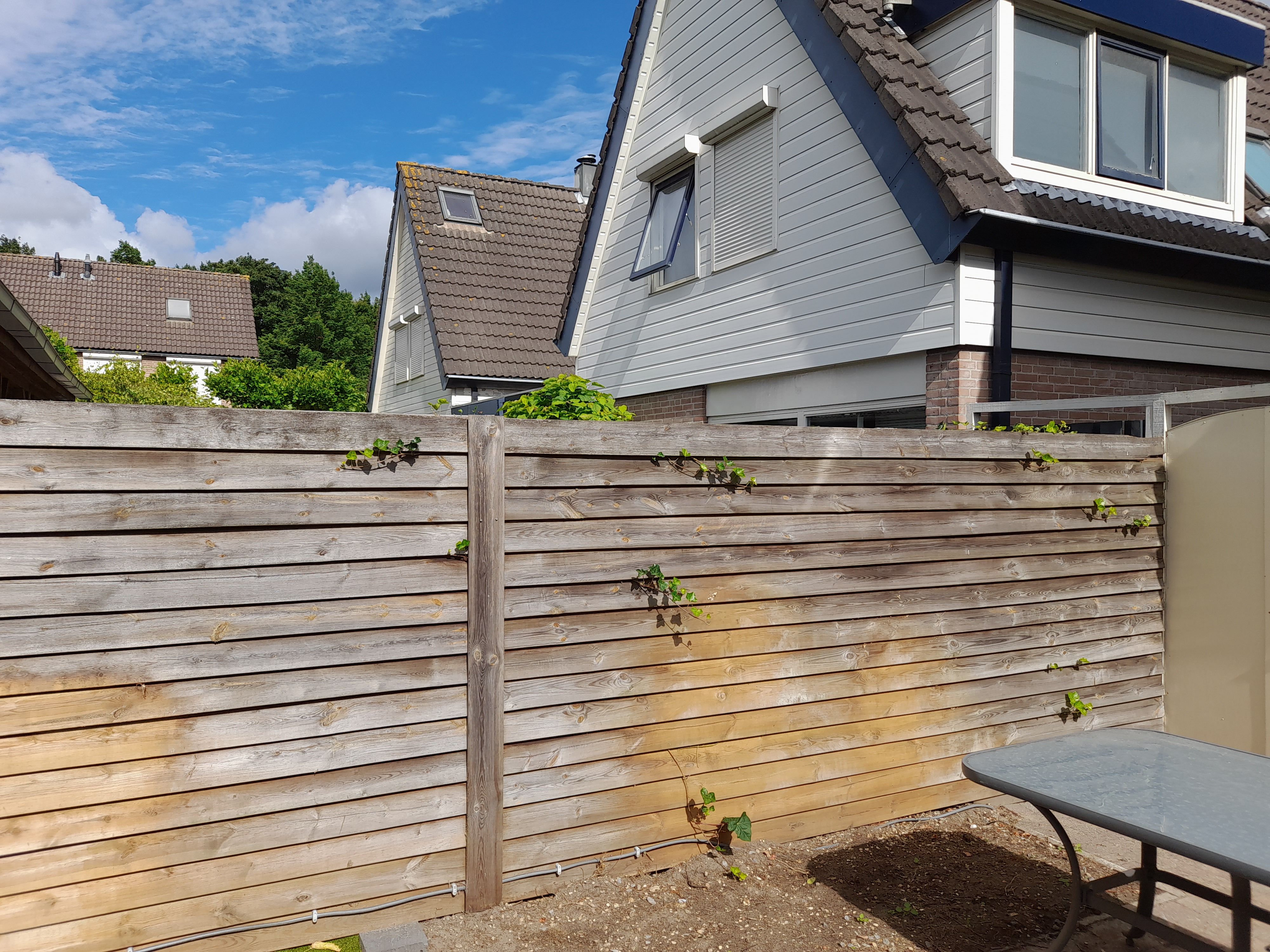 Hek/Schutting repareren: Schoonmaken of beitsen - Werkspot