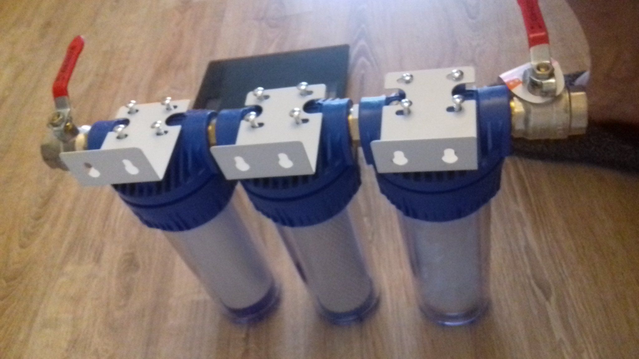 Monteren en plaatsen waterfilters in hoofd waterleiding en verplaatsen ...